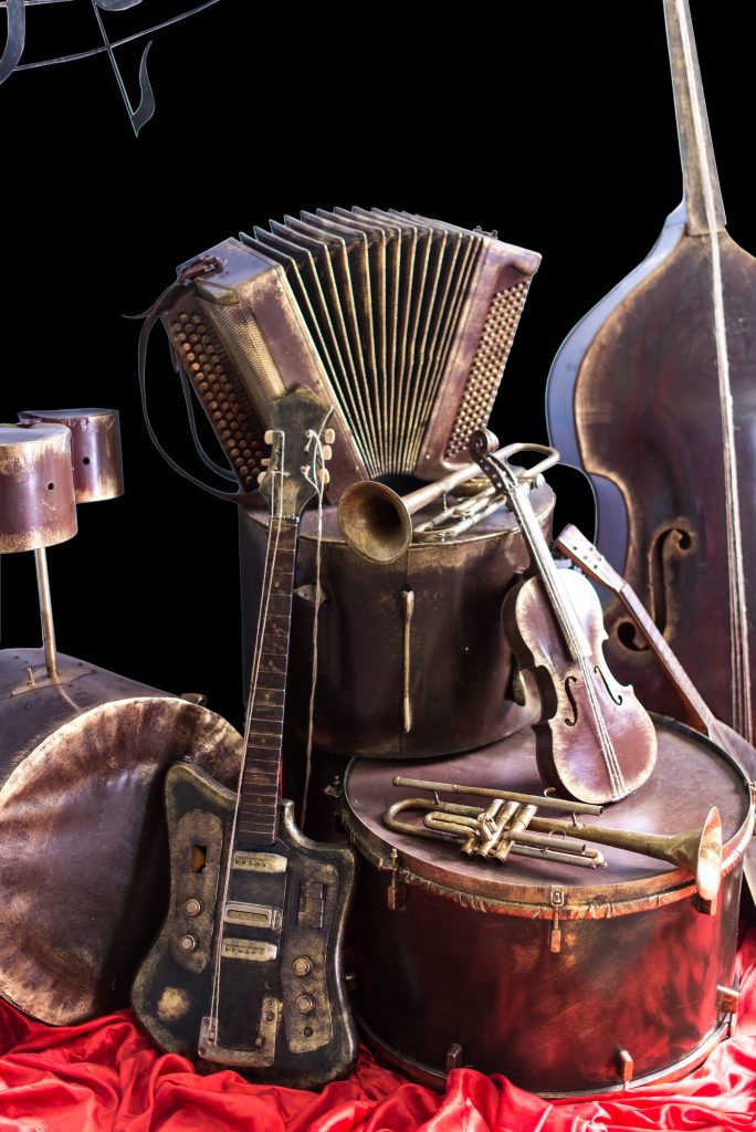 Old vintage musical instruments on a black background. Classical music ...